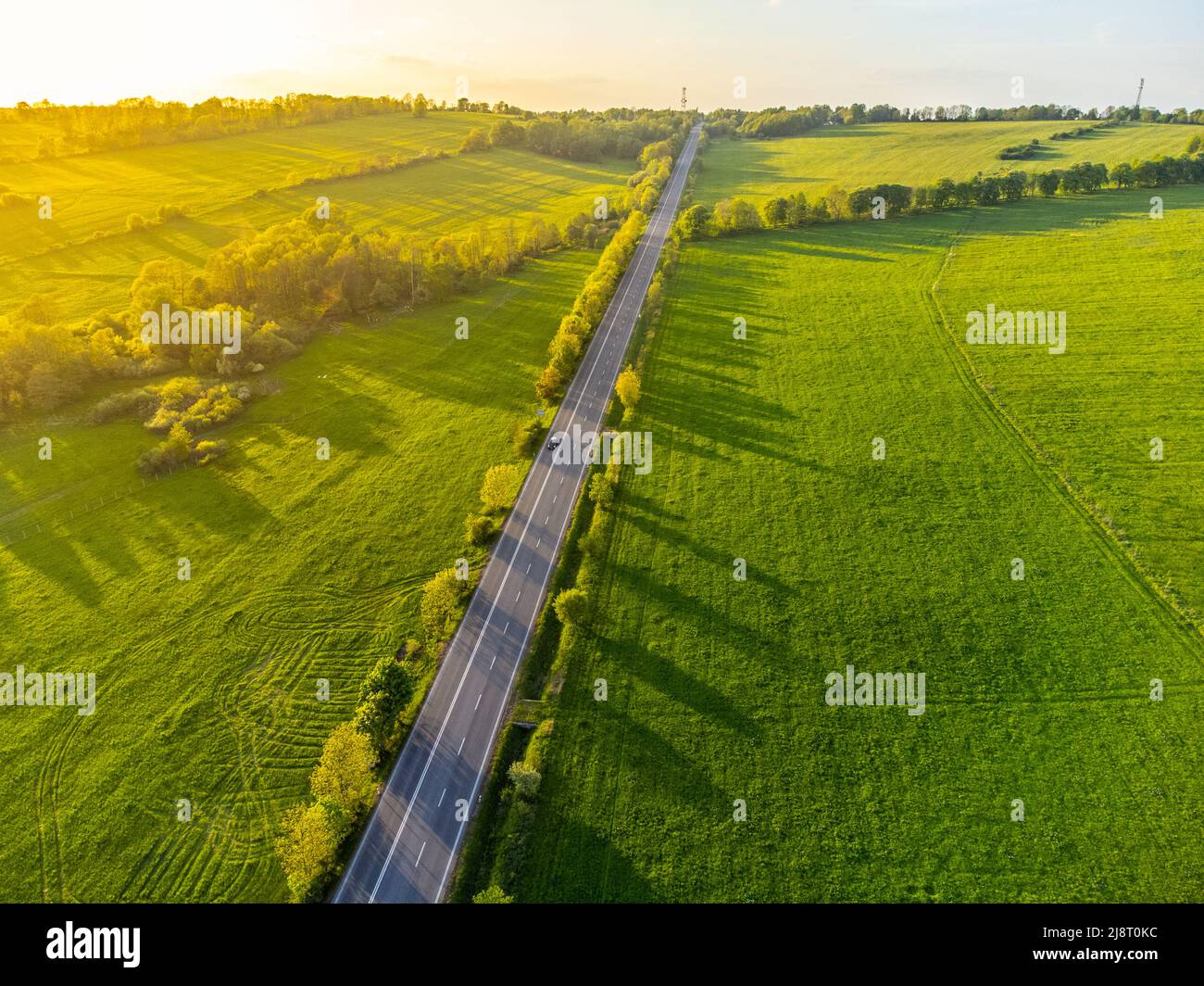 Straight asphalt road from above Stock Photo - Alamy