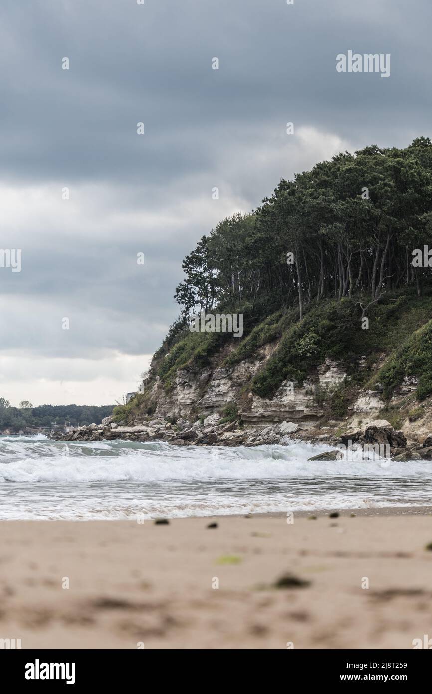 A beautiful cliff next to the beach Stock Photo - Alamy