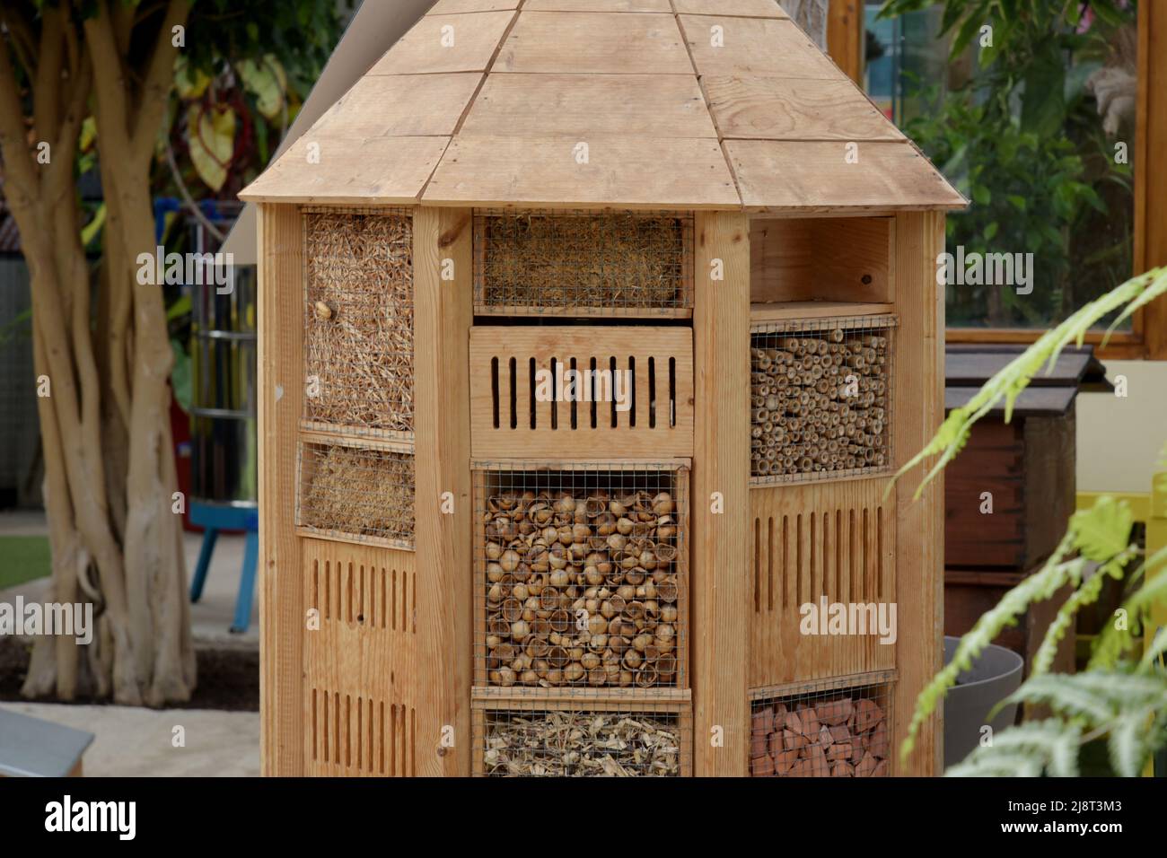 Insect house and logs hi-res stock photography and images - Alamy