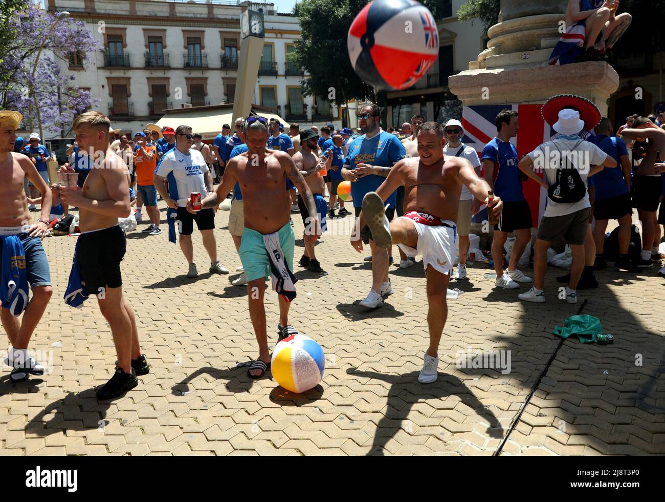 Rangers fans kick inflatable beach balls in the Alameda de Hercules ...