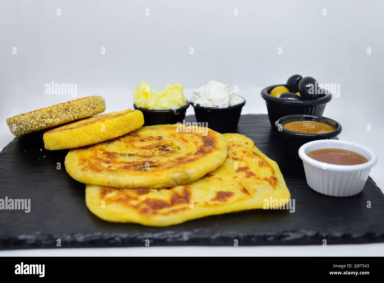 Moroccan breakfast. Moroccan pastries with honey, butter, ghee and ...