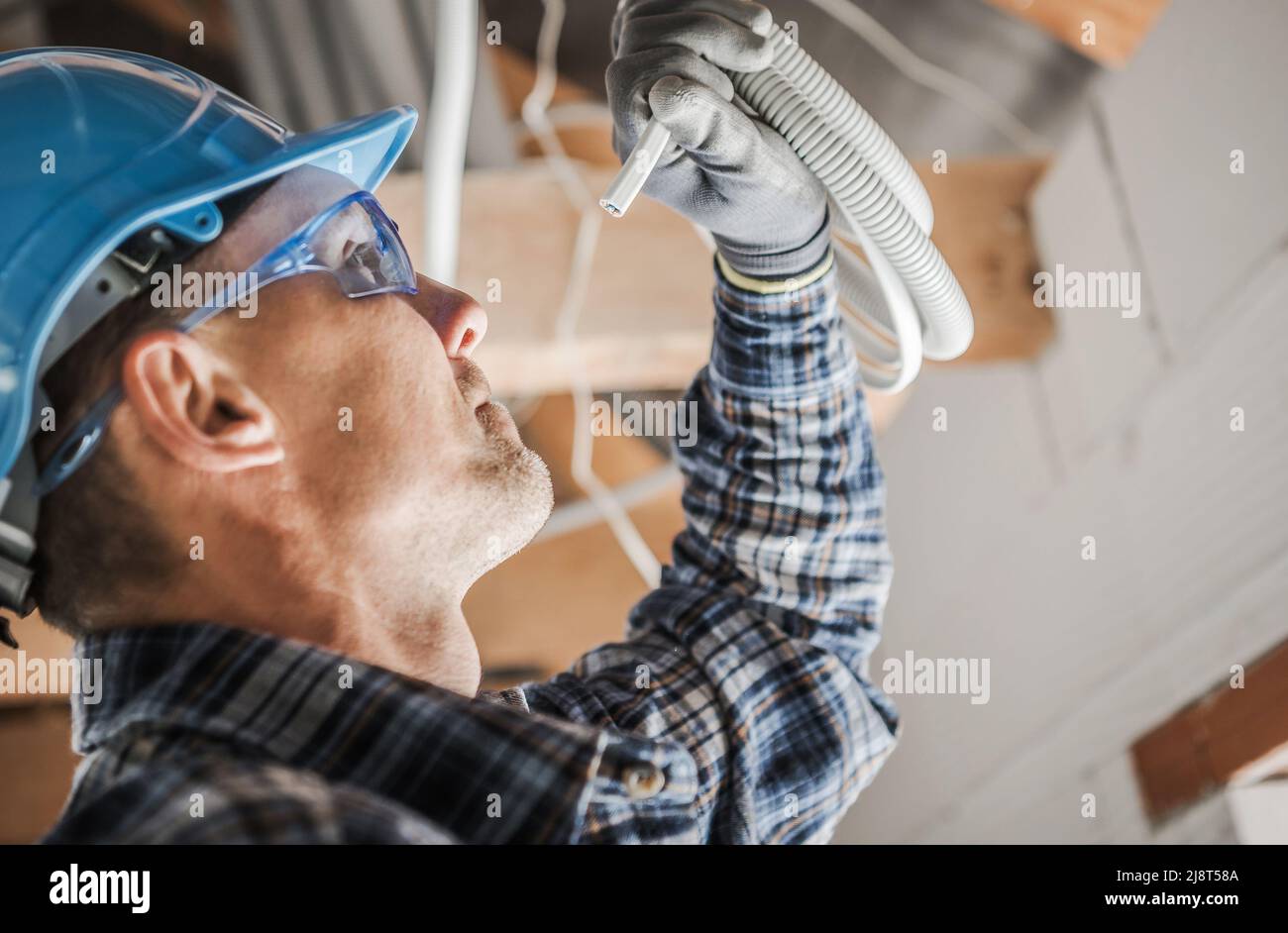 Professional Electrician Closer Look. Caucasian Electric Worker ...