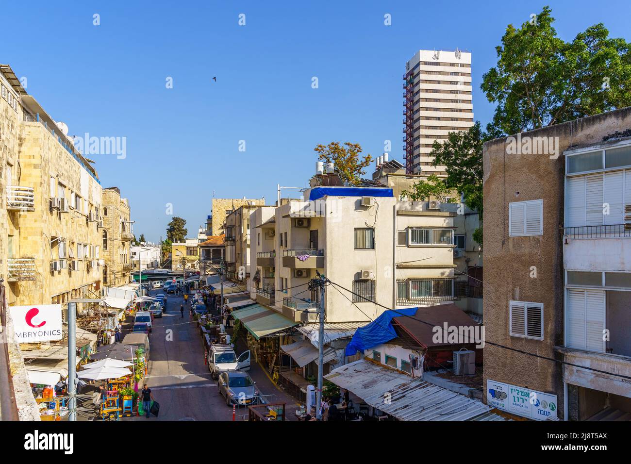 Haifa, Israel - May 12, 2022: Restaurants scene in Talpiot Market, with ...
