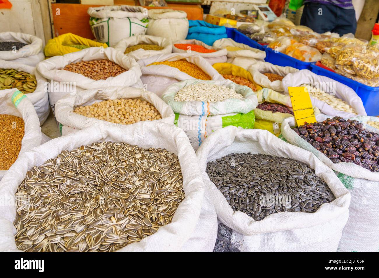 View of sacks with various food products on sale in Talpiot Market ...