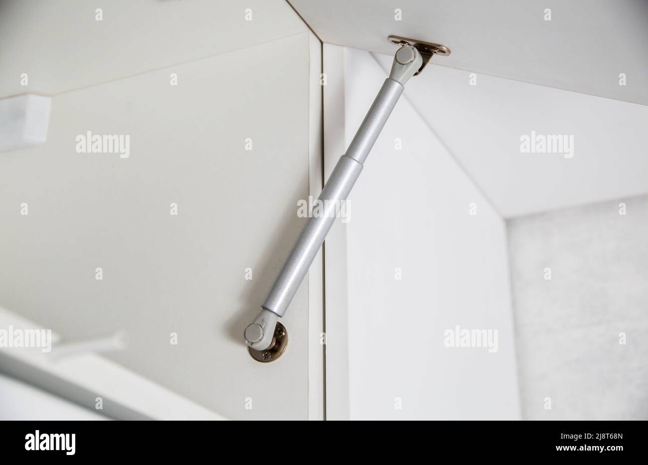 Retractable gas shock absorber for opening the drawer in the kitchen ...