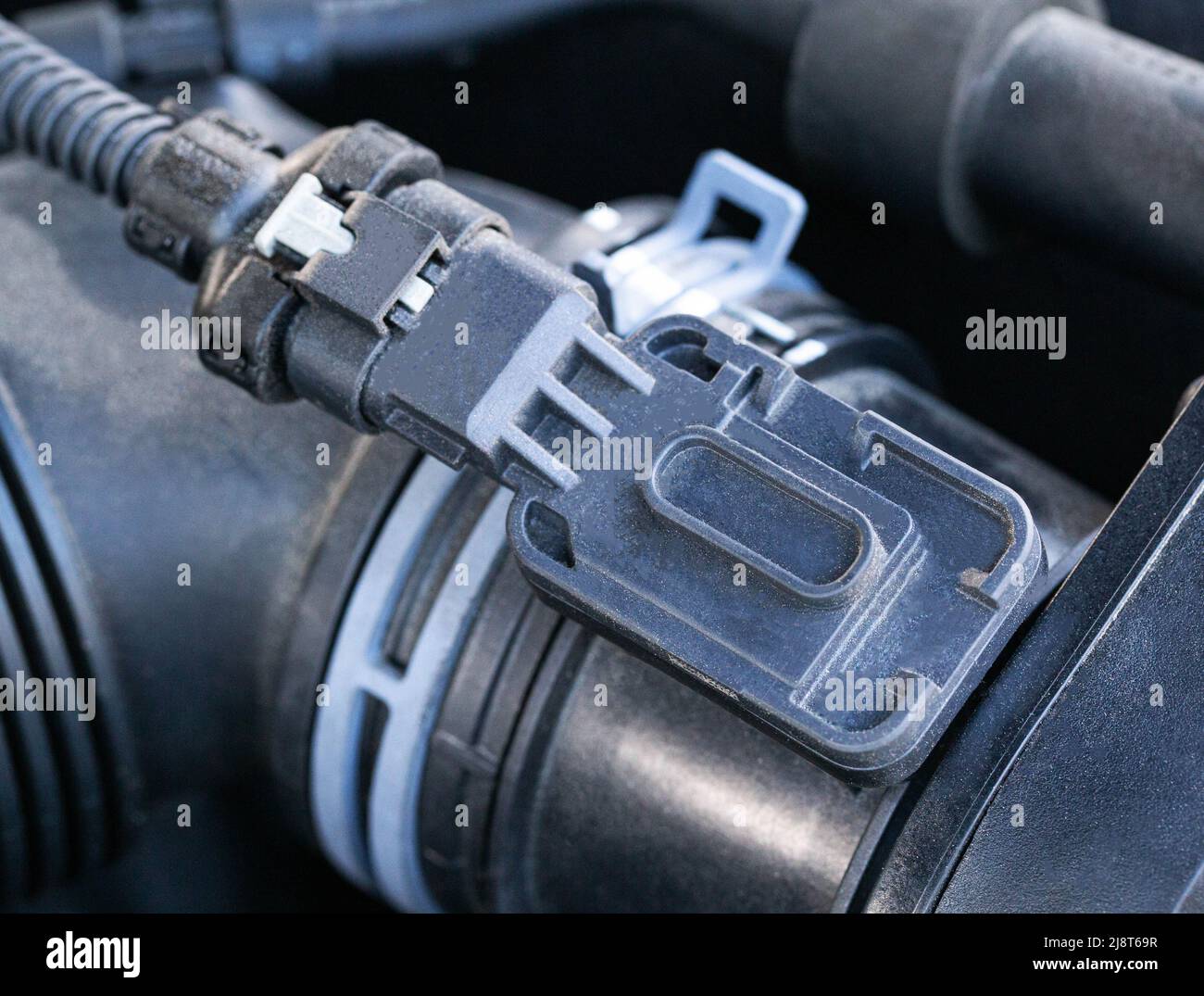 Automotive air flow sensor, close-up. Measures the amount of air ...