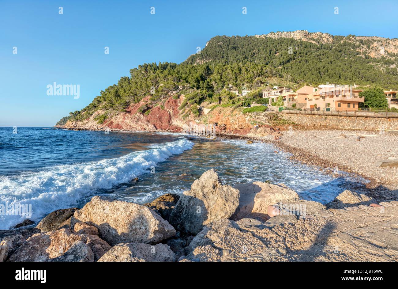 Beach at Port de Valldemossa in rocky UNESCO world heritage Serra de ...