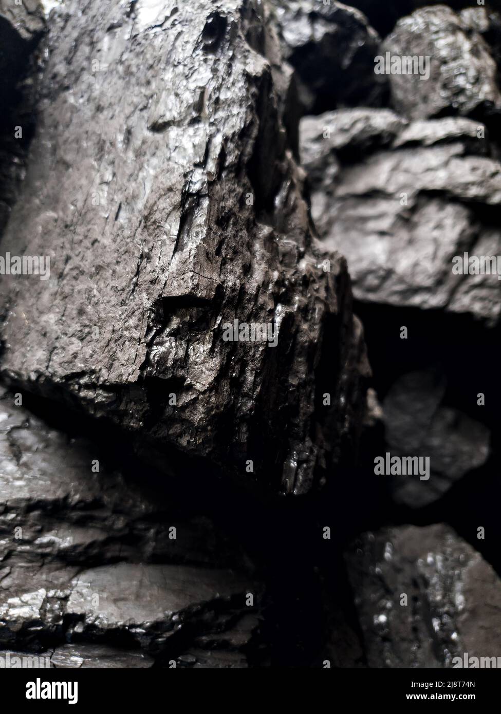 Close-up of black coal stones. fuels and minerals. Background Stock ...