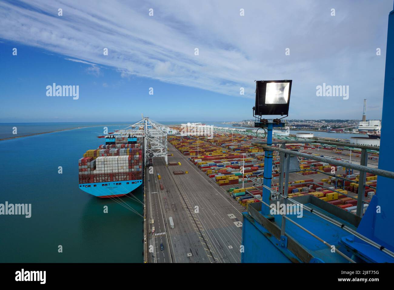 General view of container ship unloading under giant gantries at a ...