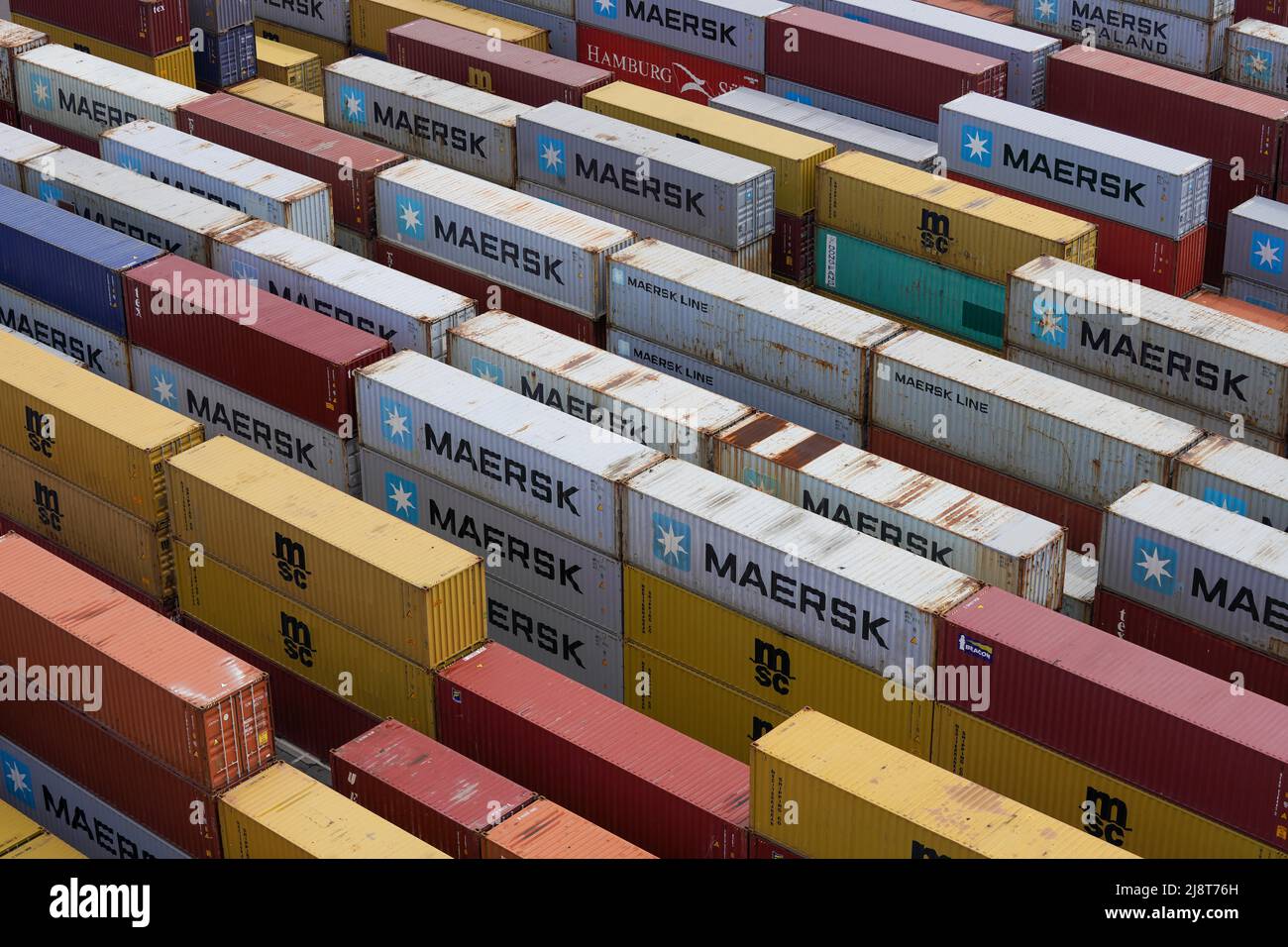 General view of container ship unloading under giant gantries at a ...