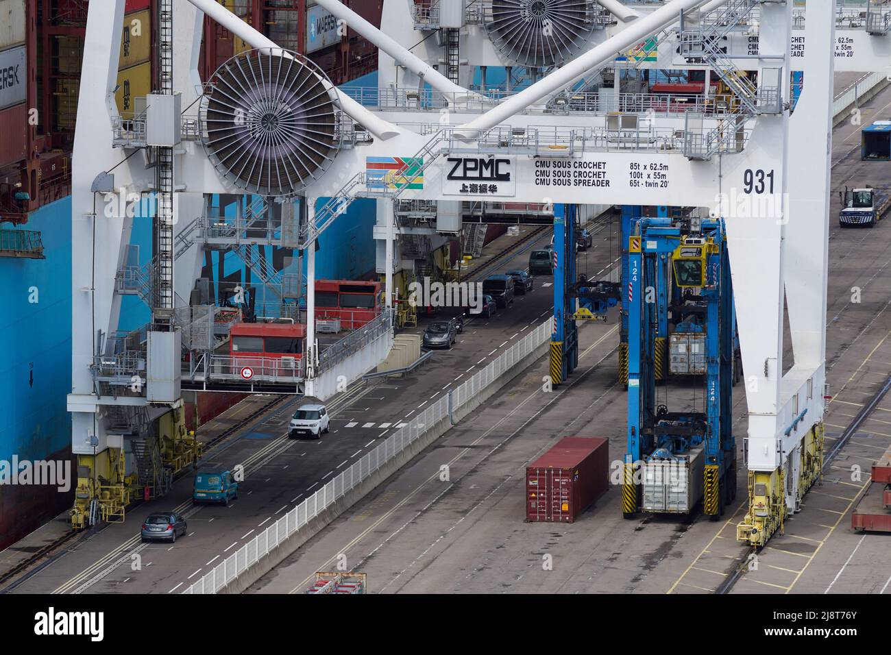 General view of container ship unloading under giant gantries at a ...