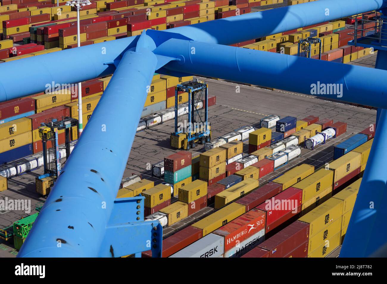 General view of container ship unloading under giant gantries at a terminal in the Haropa port ...