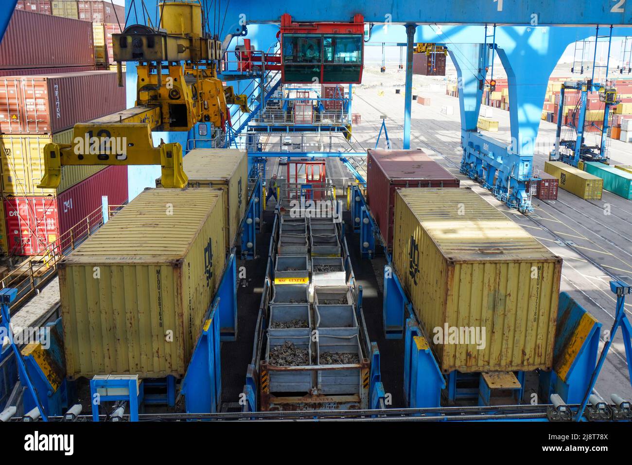 General view of container ship unloading under giant gantries at a terminal in the Haropa port ...