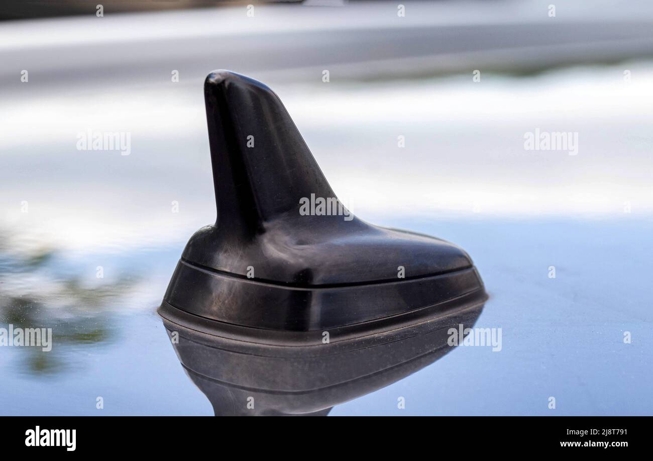 Modern car antenna on the car roof, system GPS Stock Photo - Alamy