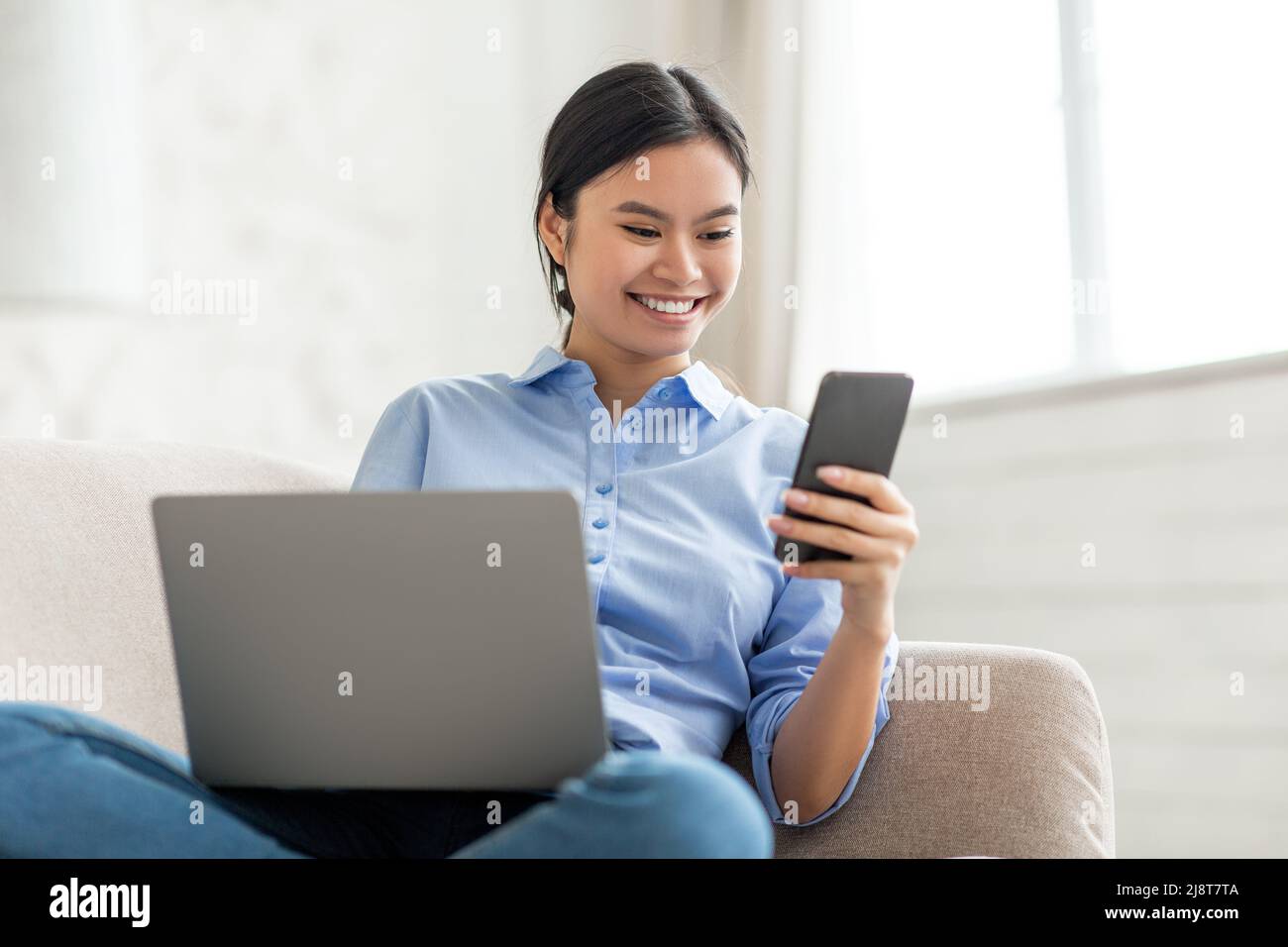 Cute korean lady freelancer working from home Stock Photo - Alamy