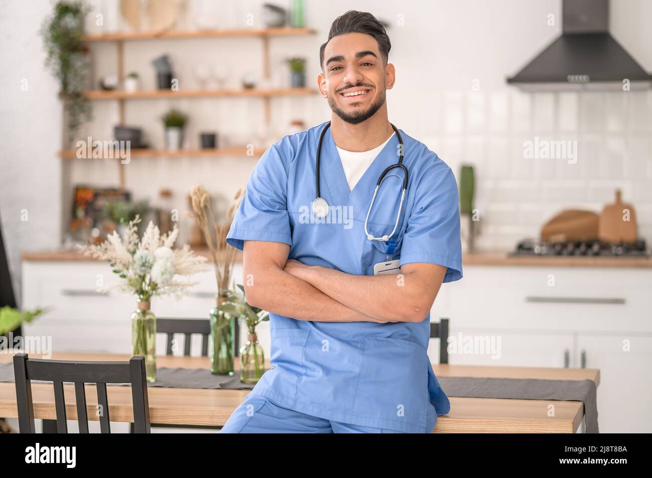 Doctor seated hi-res stock photography and images - Alamy