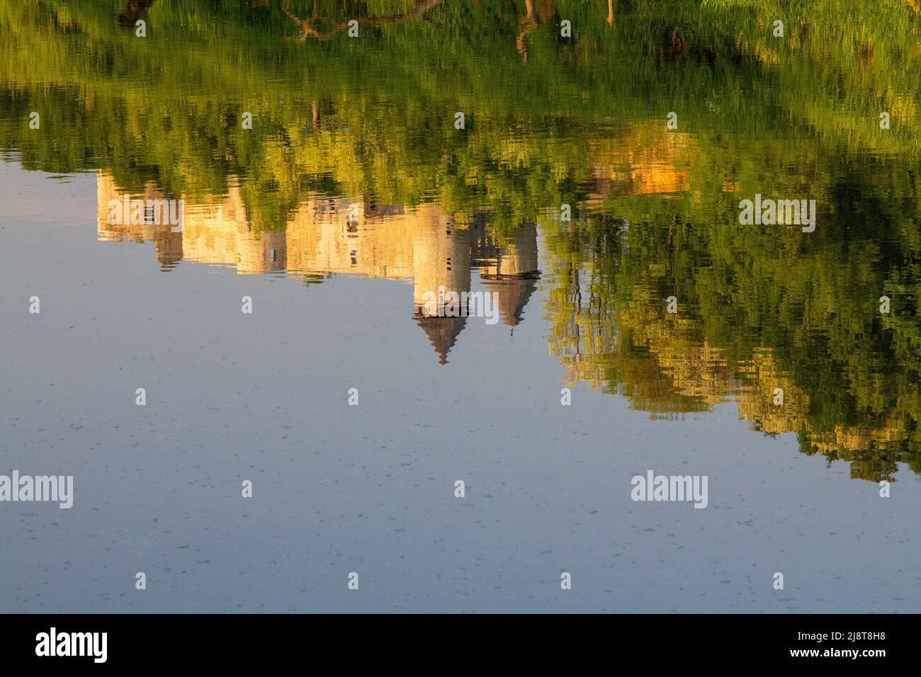 The reflection of Novigrad na Dobri fortress on the Dobra River ...