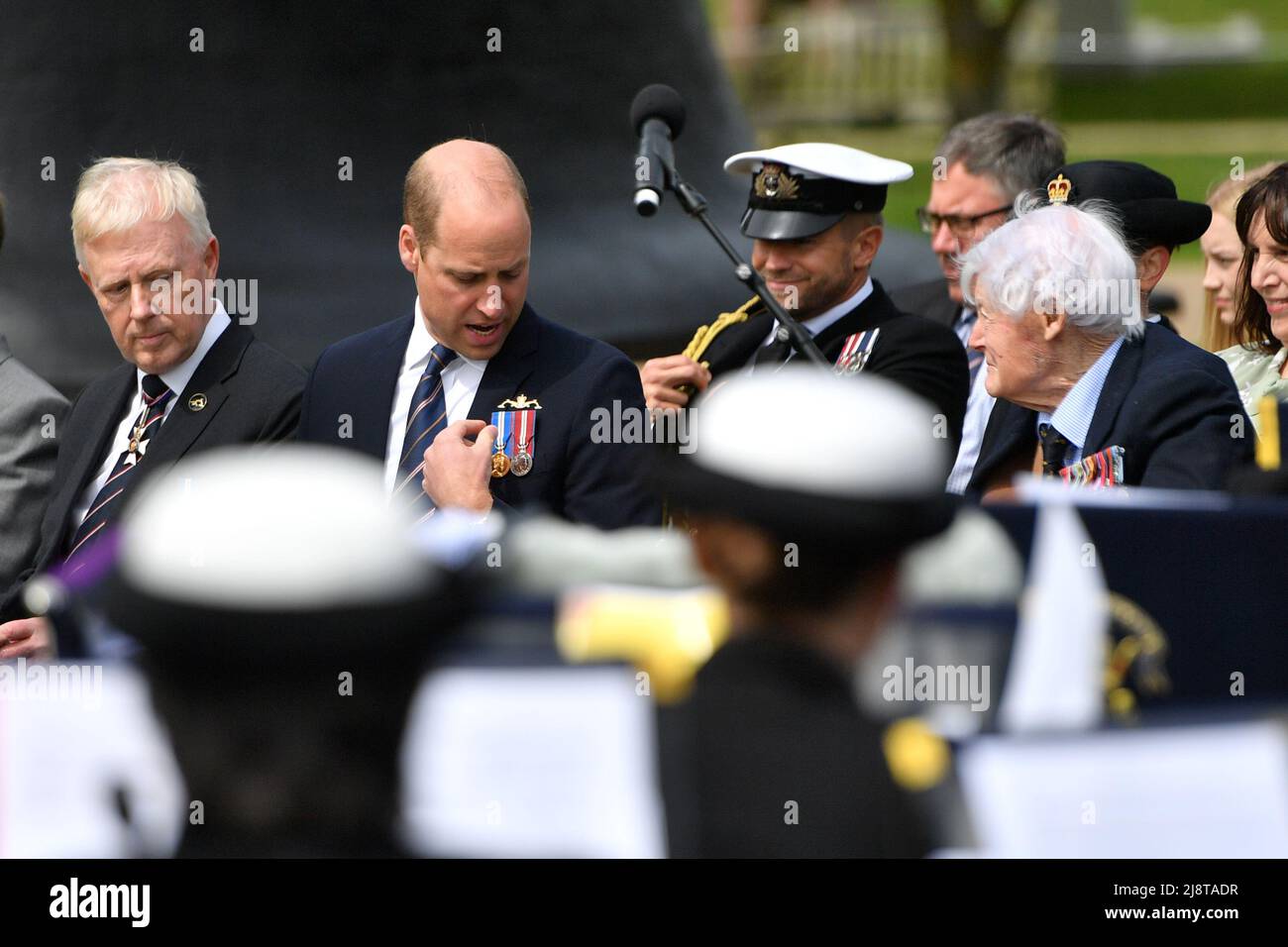 The Duke of Cambridge speaks with Michael Tibbs during the unveiling of ...