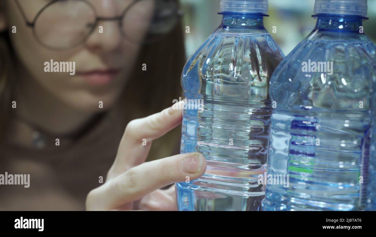 Buying bottled water hi-res stock photography and images - Alamy