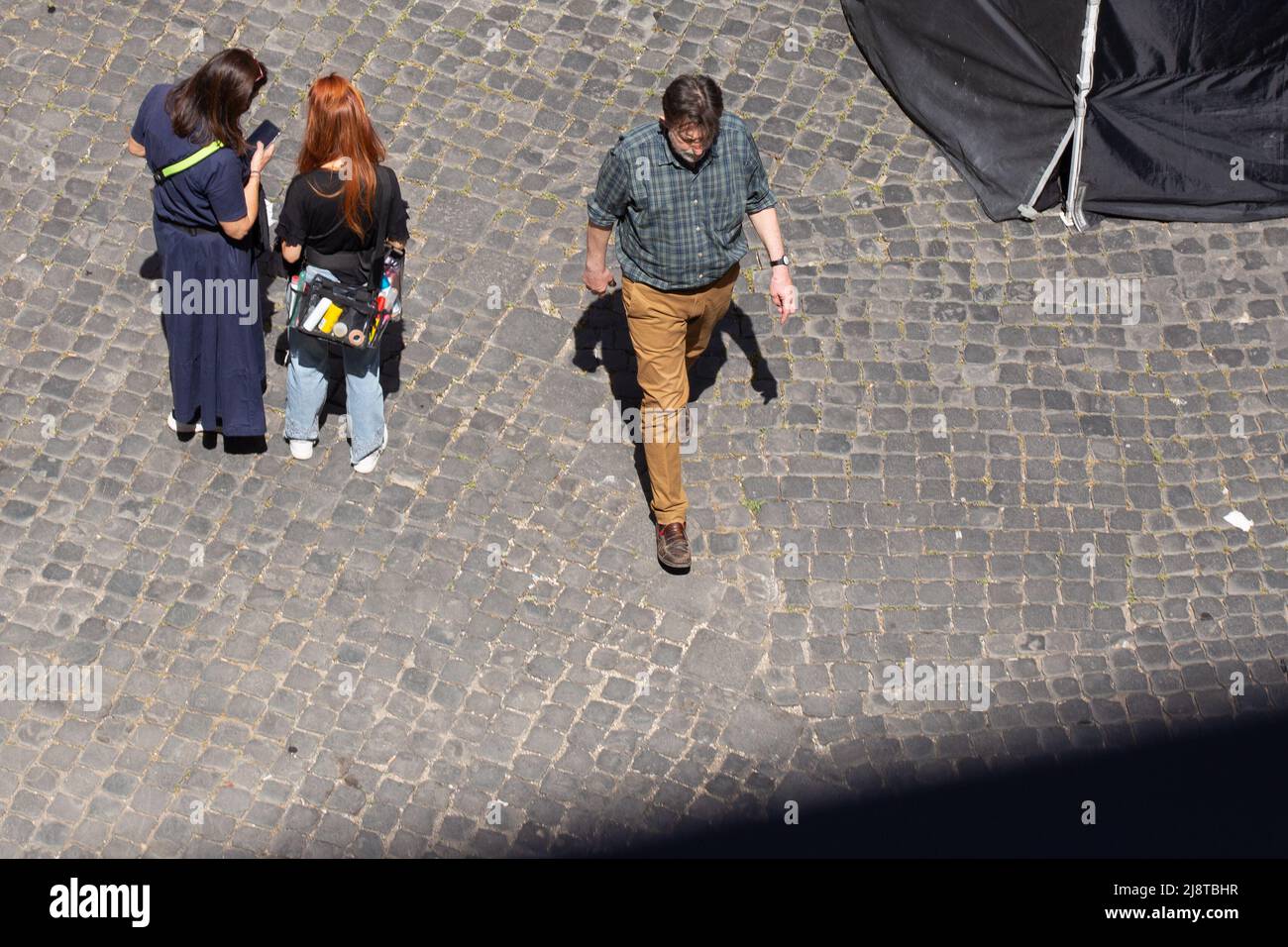 Italian director Nanni Moretti walks on the set of his new film "Il Sol ...