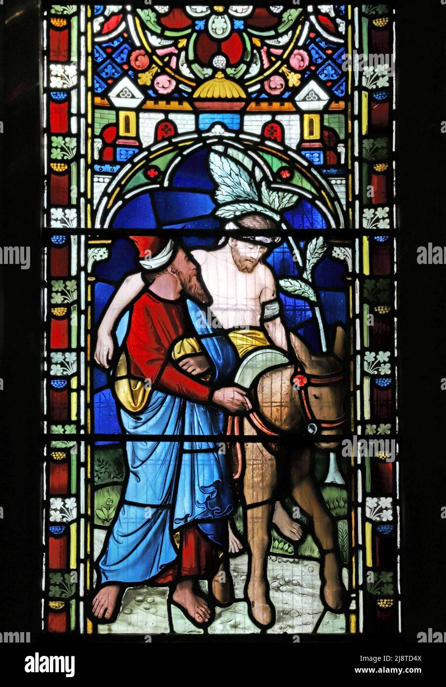 A stained glass window depicting the Parable of the Good Samaritan, St ...