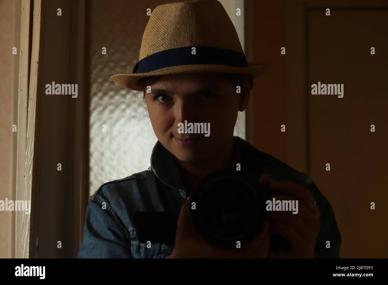 Defocus young woman take photography in mirror reflection. Millennial ...