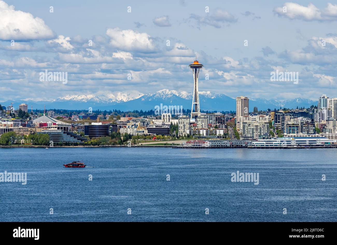 Cascade Mountain can be seen behind the Seattle skyline in Washington ...