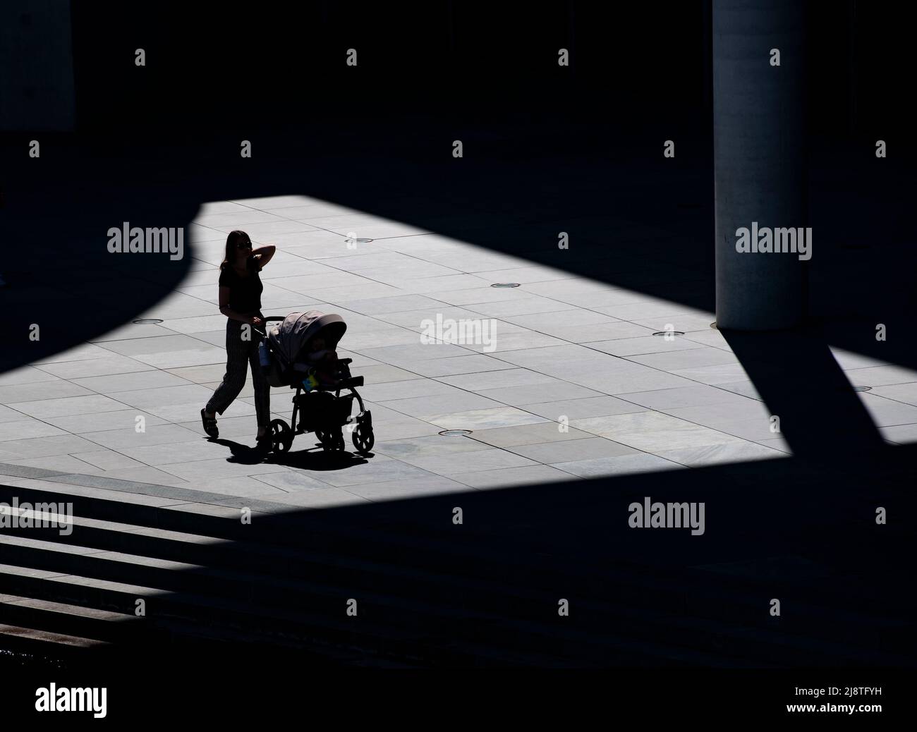 Woman walking along spree river hi-res stock photography and images - Alamy