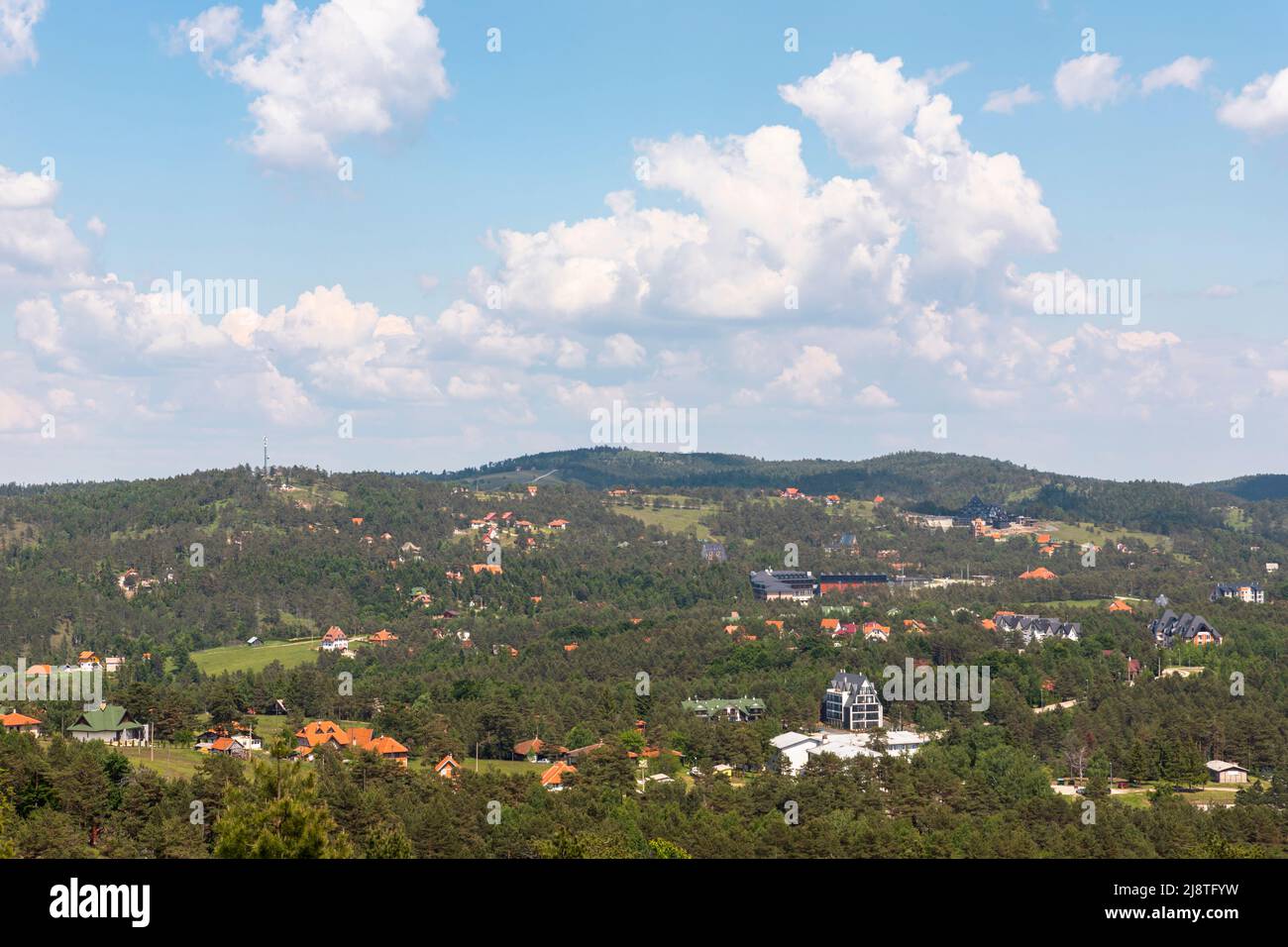 Settlement at Divcibare mountain in Serbia with amazing sky with white ...