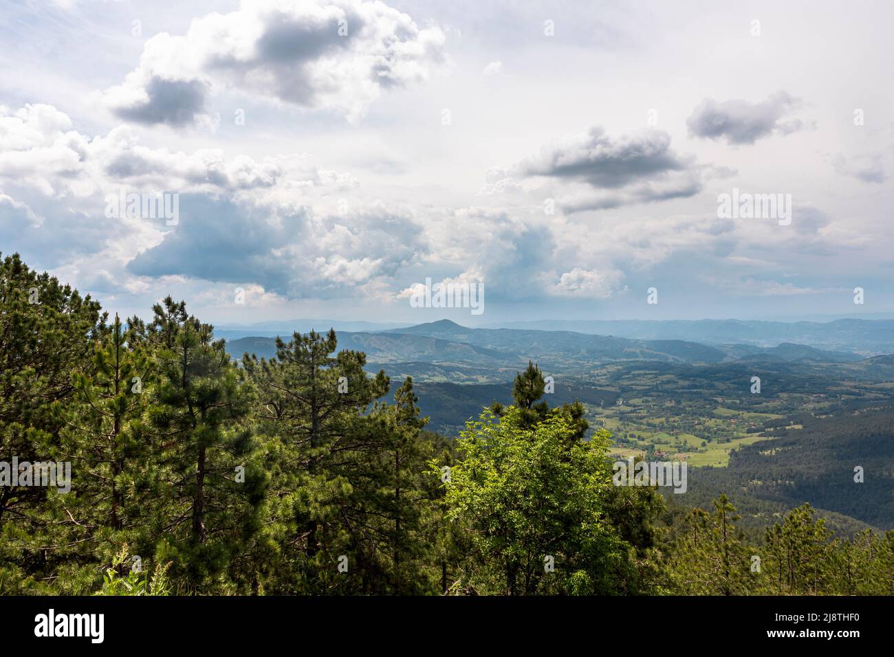 Divcibare mountains in Serbia with amazing sky with white fluffy clouds ...