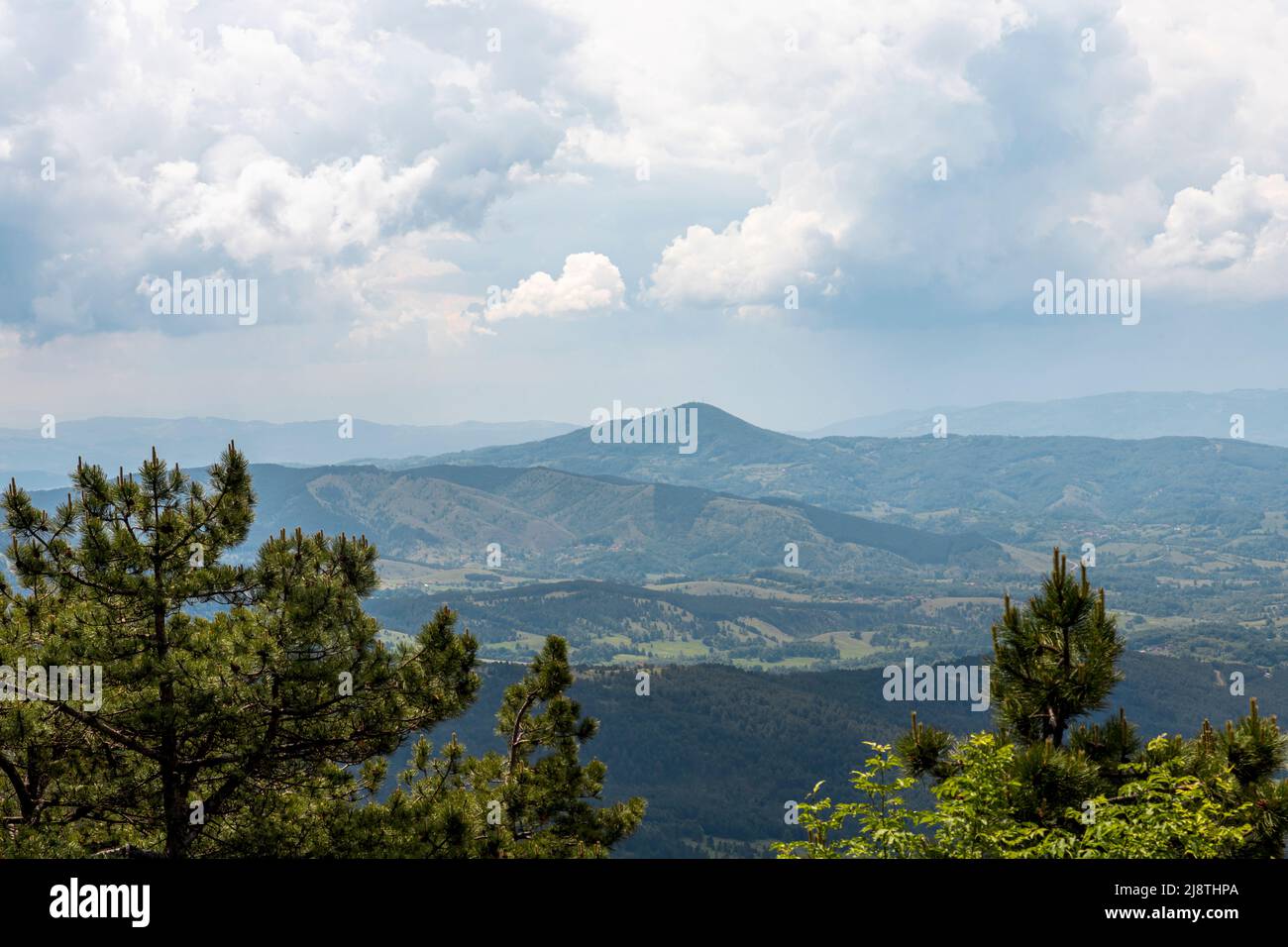 Divcibare mountains in Serbia with amazing sky with white fluffy clouds ...