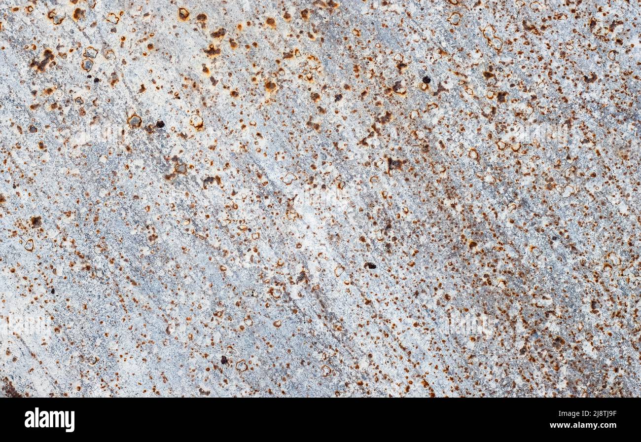 Scattered rust and spot textures on a damaged old metal sheet Stock ...