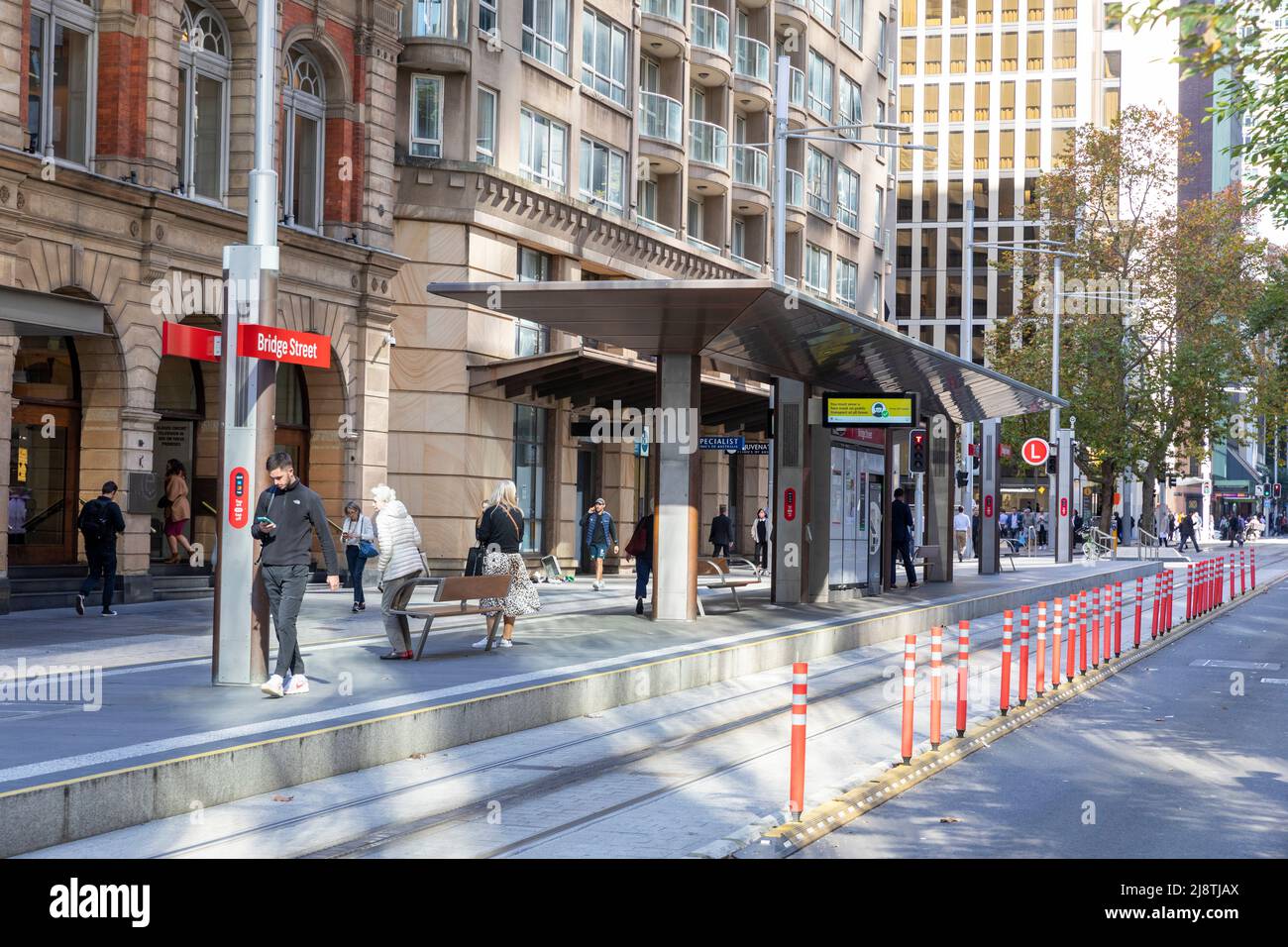 Sydney light rail station, Bridge street, with commuters waiting for a ...