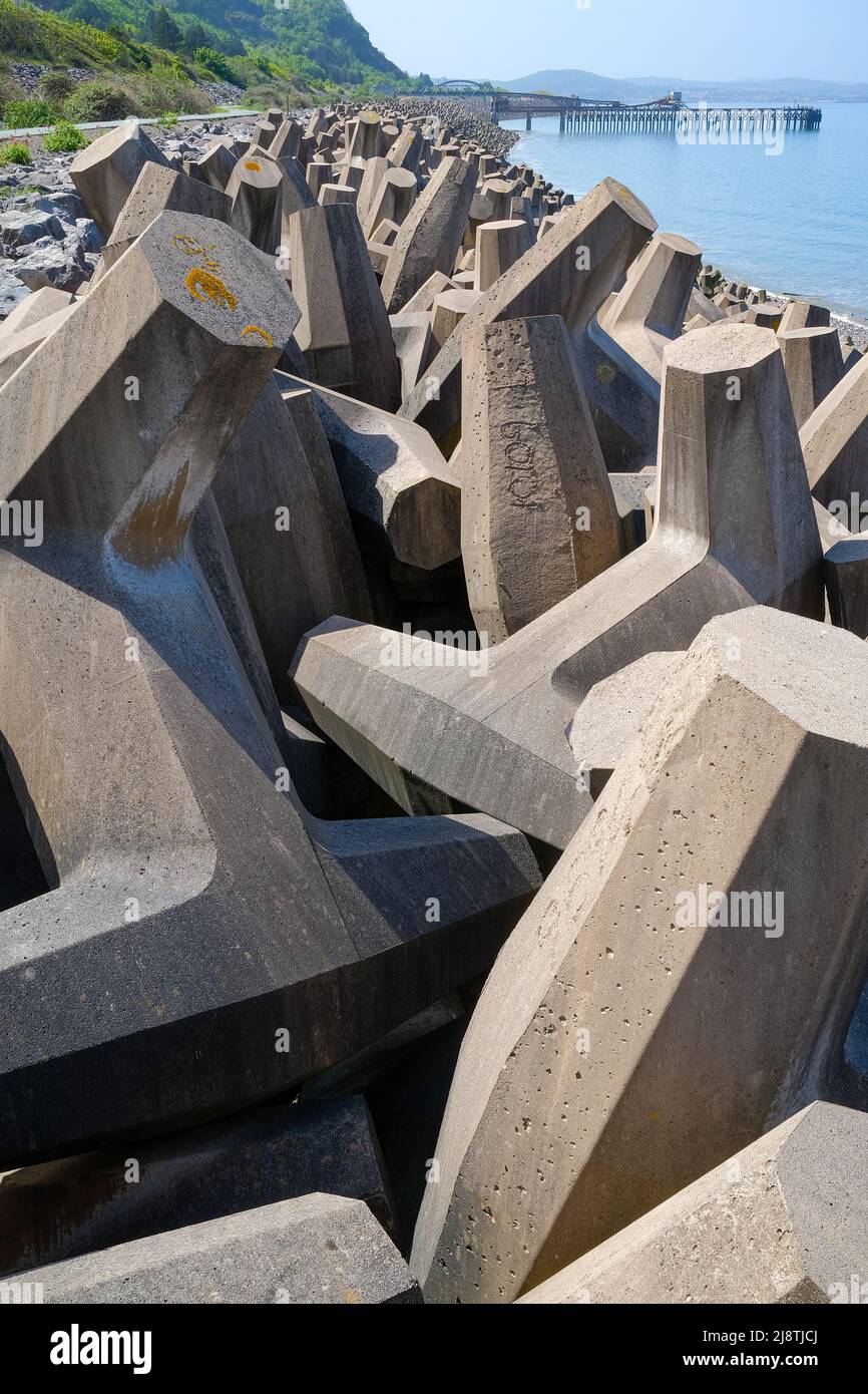 concrete sea defense groynes along the coast North Wales UK Stock Photo ...