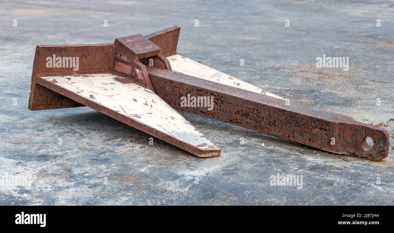 Aged rustic heavy industrial metal object on the ground Stock Photo - Alamy