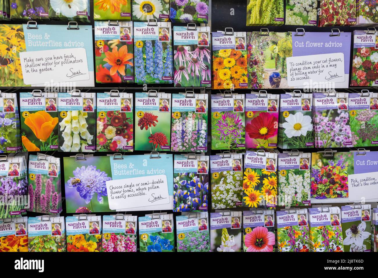 Seed packets in garden centre Stock Photo - Alamy