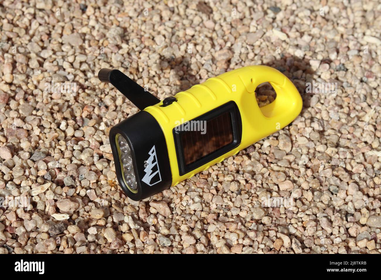 Hand cranked, solar charged torch Stock Photo - Alamy