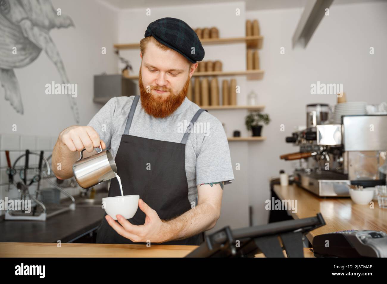 Coffee Business Concept - handsome bearded man in apron making coffee ...