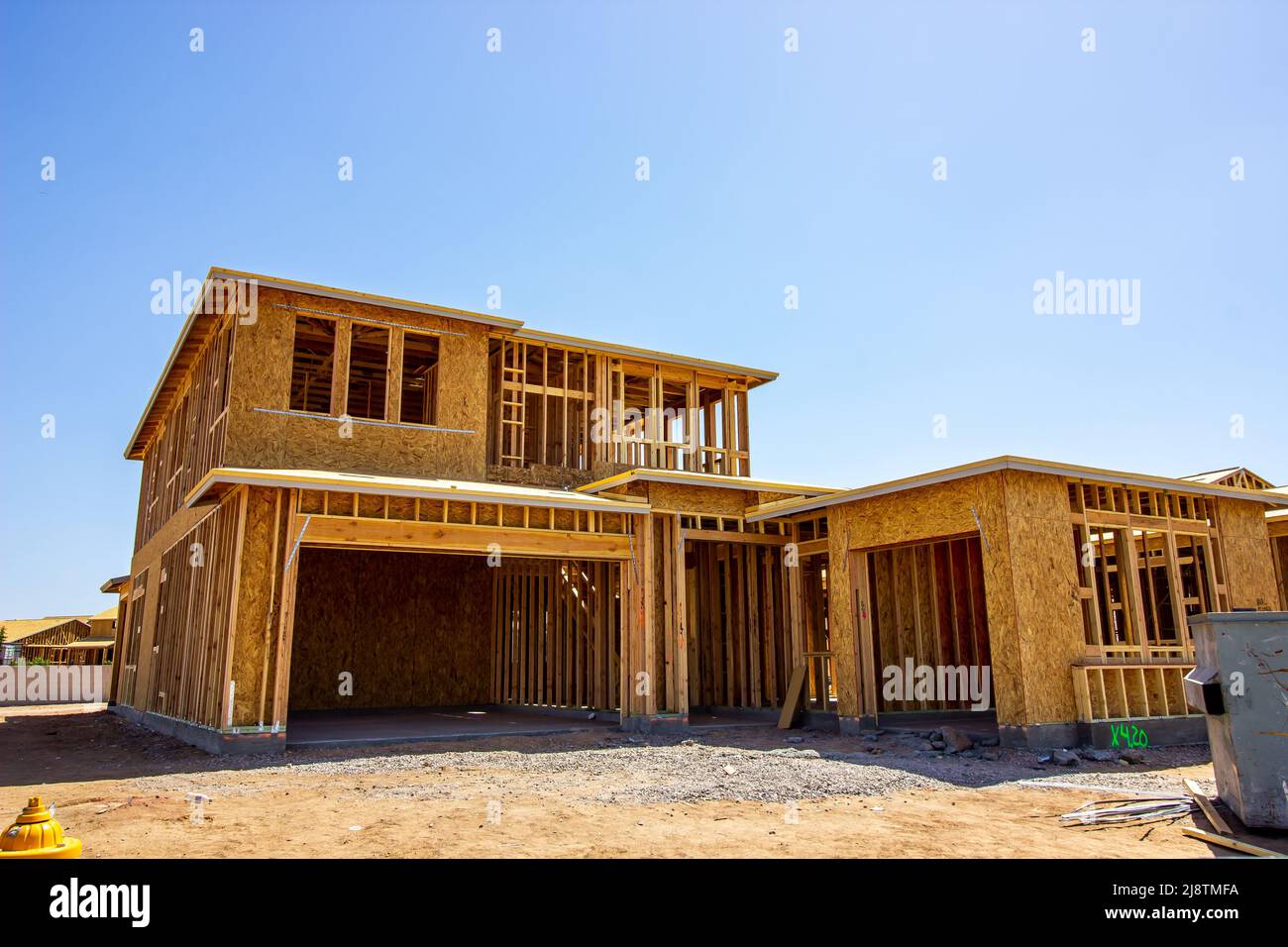 New Two Story Home Under Construction During Framing Stage Stock Photo ...