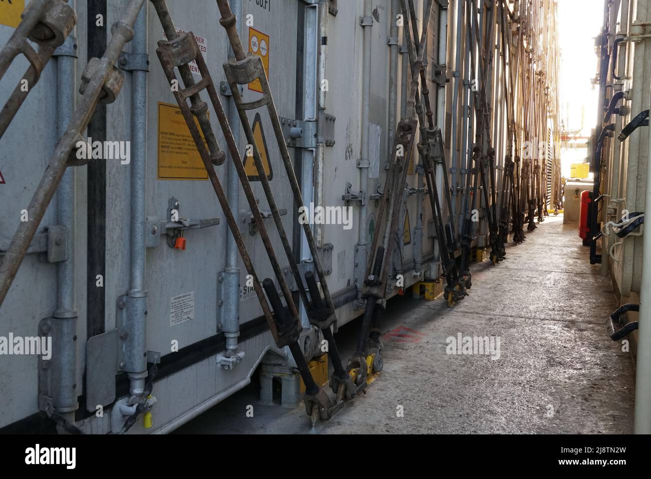 Row of the containers from different shippers secured on main deck of ...