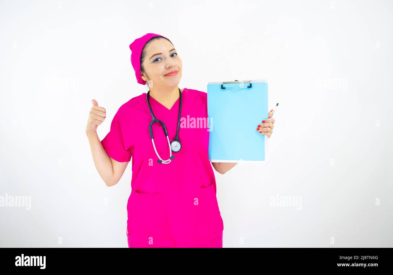 beautiful woman medical assistant, wearing uniform and pink surgical ...