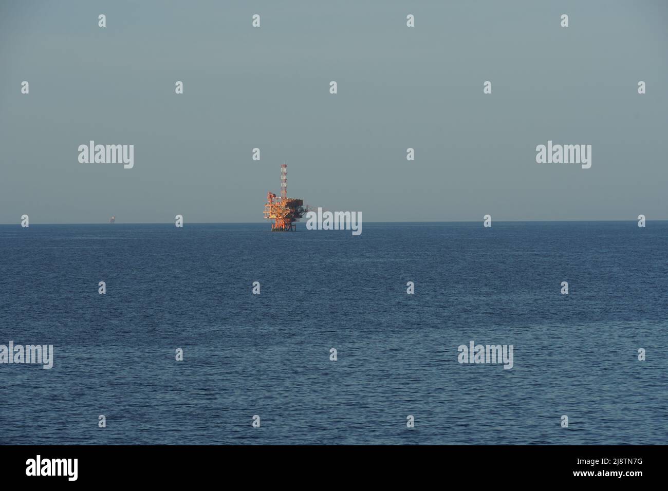 View in horizon on platform in orange color for the extraction of oil ...