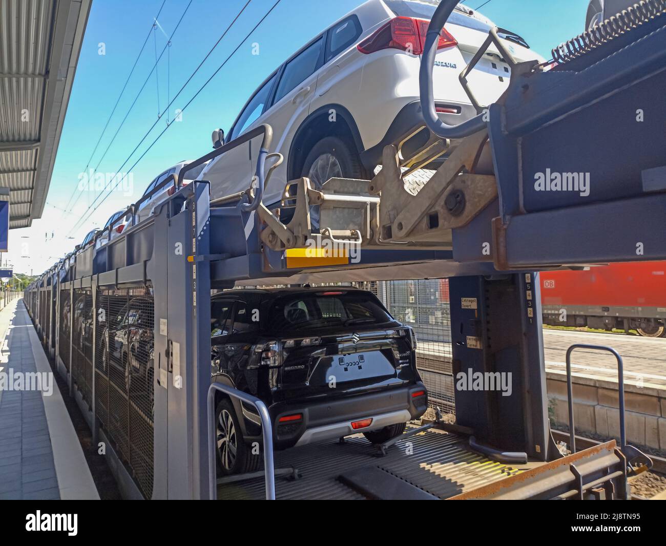 Railway train with Suzuki cars loaded into special wagons Stock Photo ...