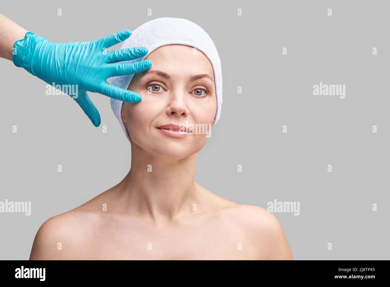 Young pretty woman studio portrait. Cosmetology concept. Esthetic woman ...
