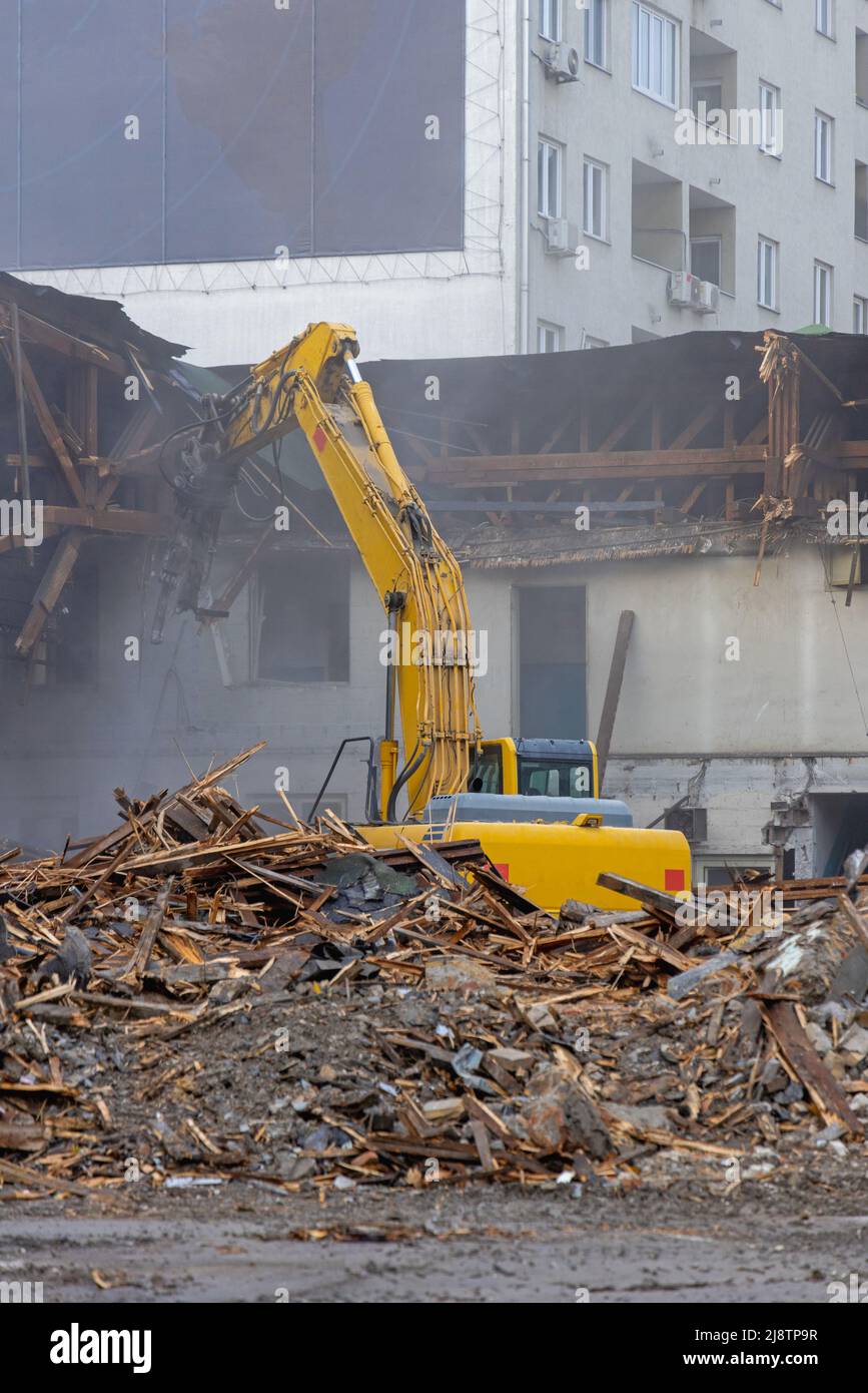 Machine Under Debris at Demolition Site Building Deconstruction Dust ...