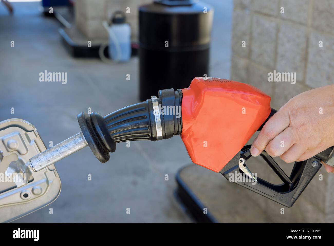 Refill filling oil gas fuel at station refueling to fill the machine ...
