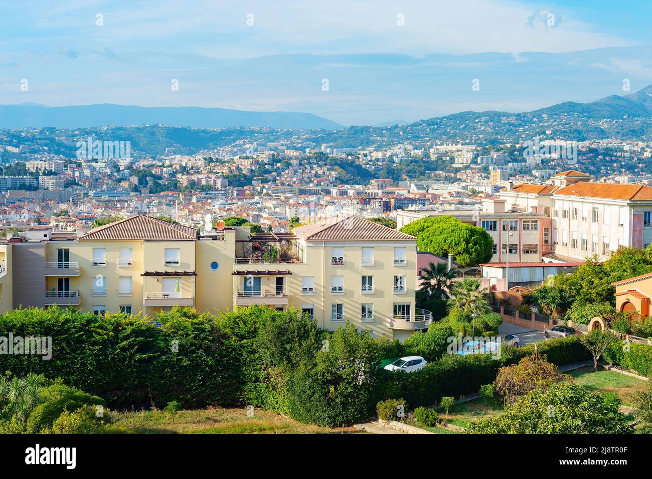 Scenic Nice cityscape with mountains view in bright sunlight, France ...