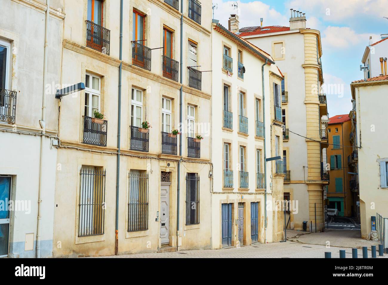 Old town narrow street with traditional architecture buildings ...