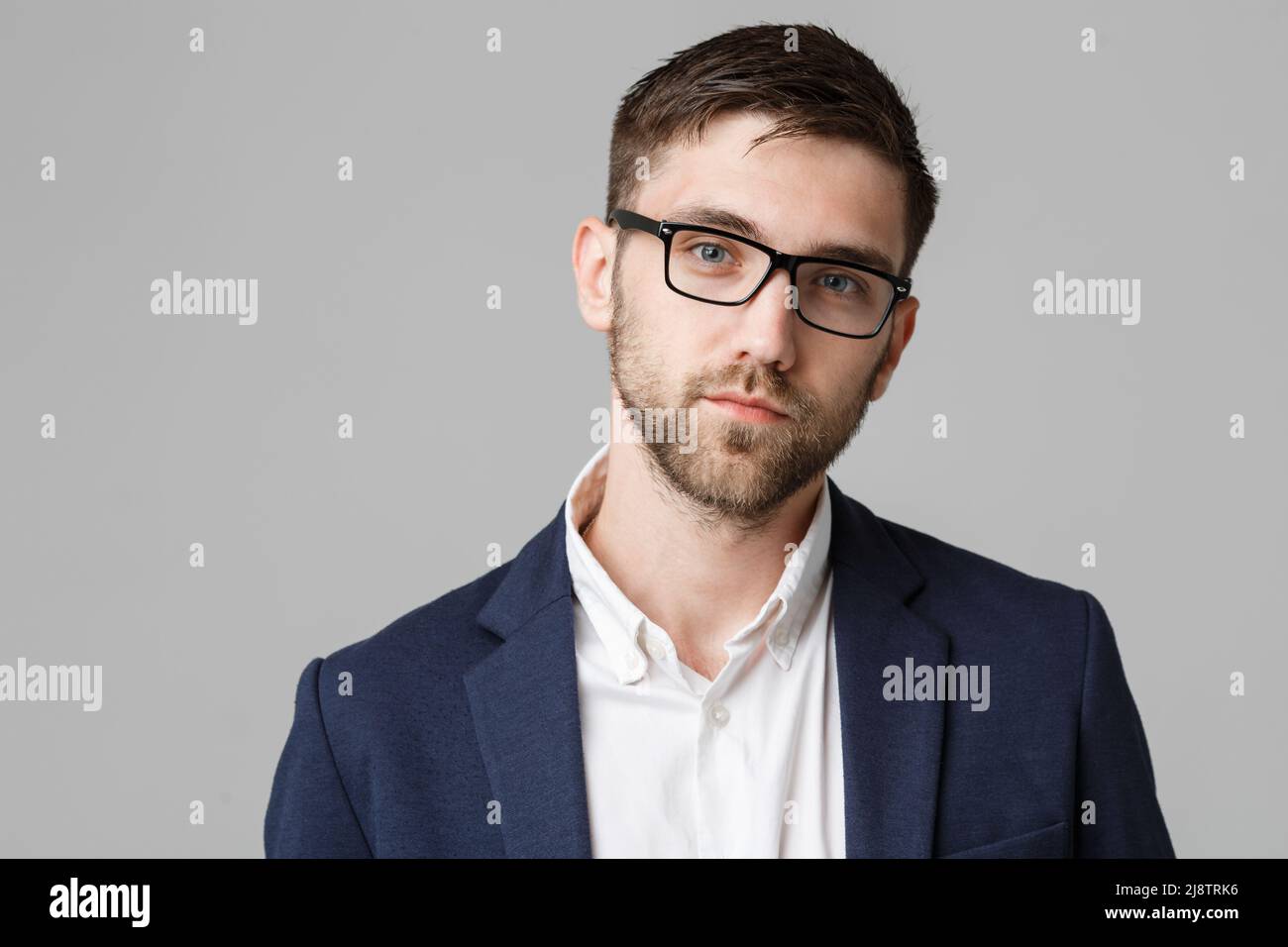 Business Concept - portrait young successful businessman posing over ... Business Concept - portrait young successful businessman posing over ...