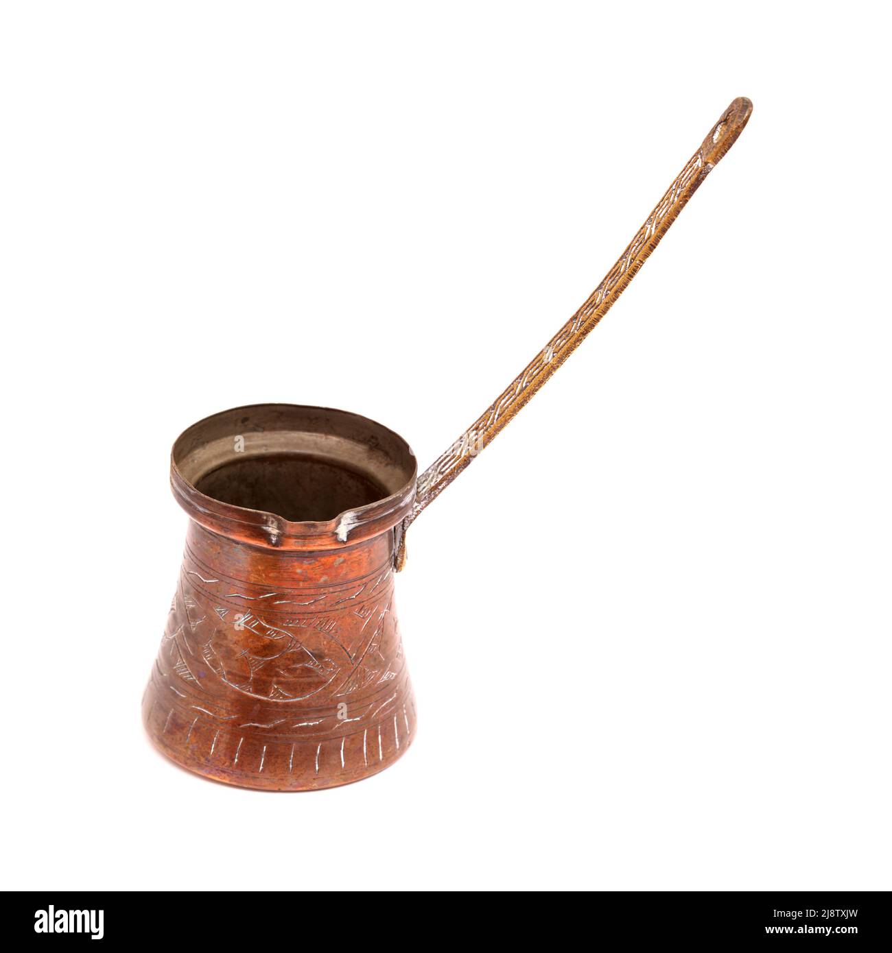 Old cezve, small long-handled coffee pot with a pouring lip, isolated ...